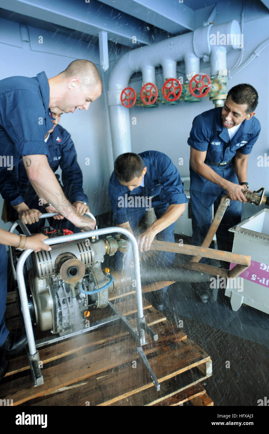 Sailors from Engineering Department, damage control division team work ...