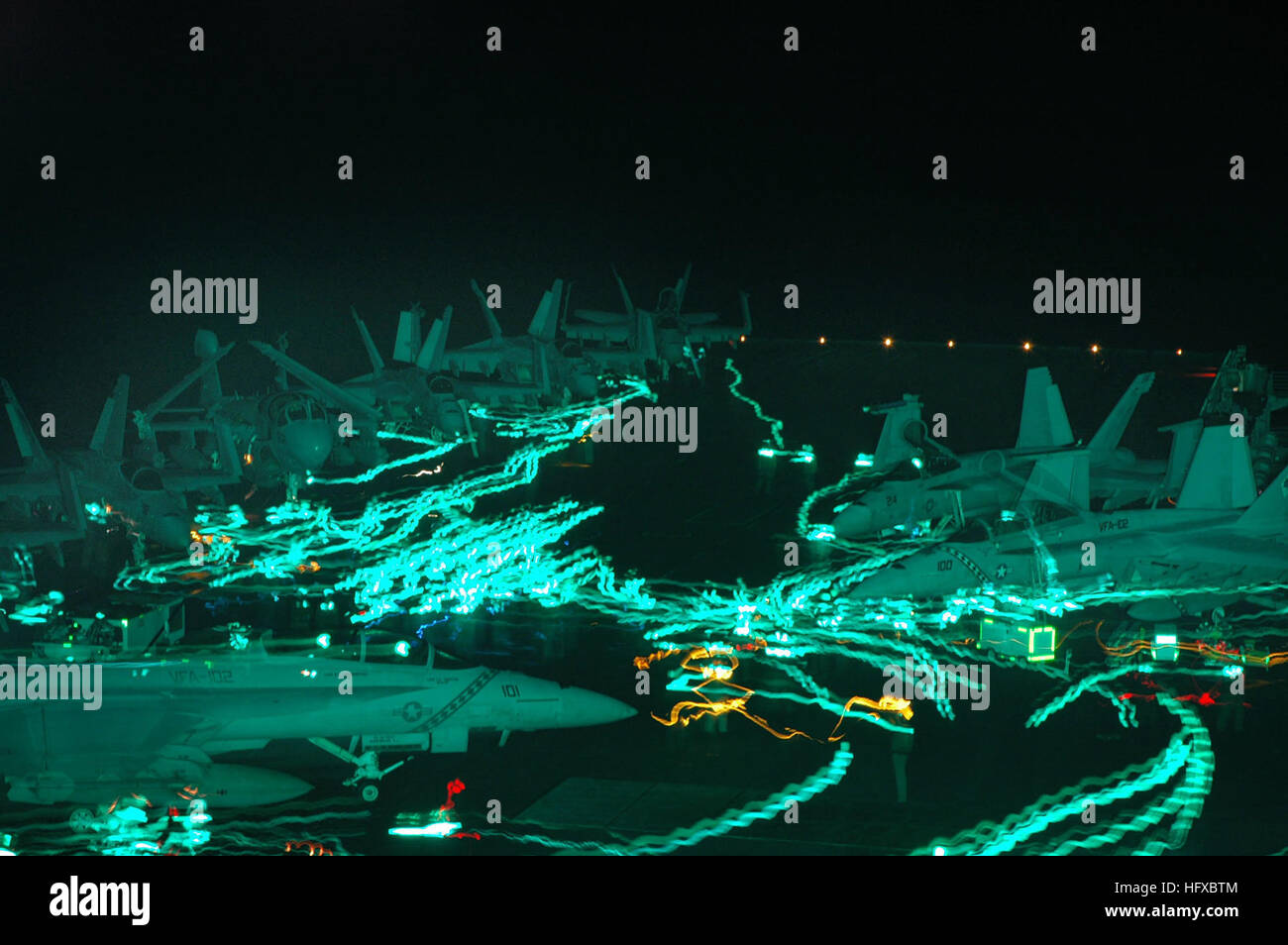 USS Kitty Hawk (CV 63) flight deck conducts night flight operations ...