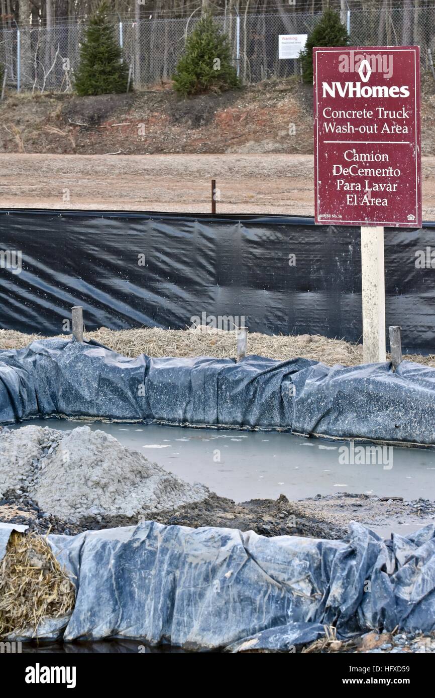 An NV homes new build site with a concrete truck wash out area sign ...