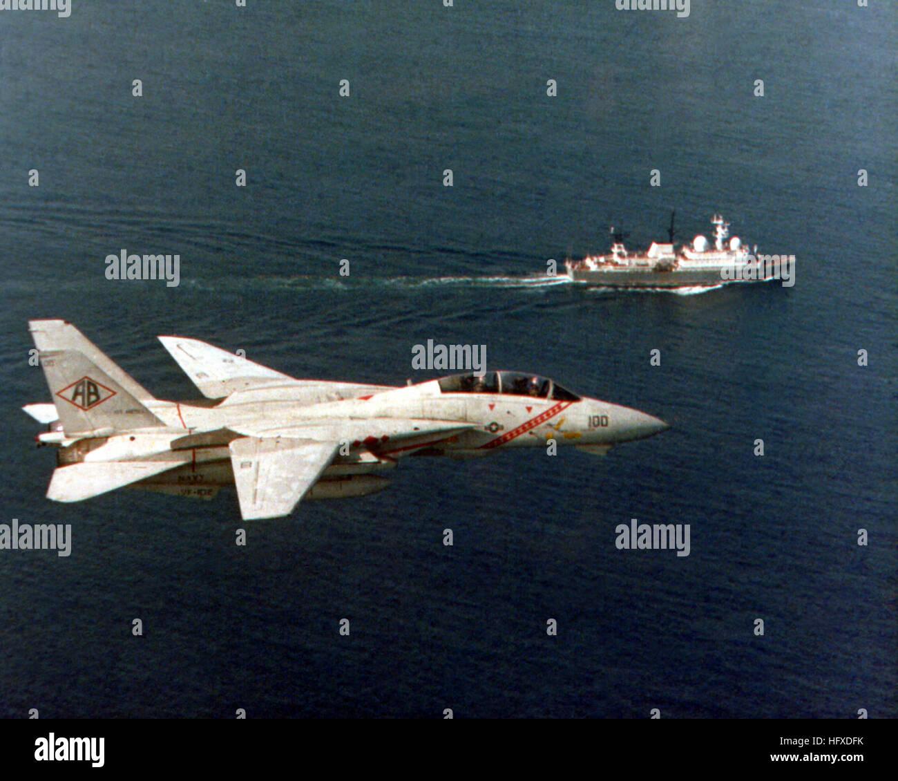An air-to-air right side view of an F-14A Tomcat aircraft from Fighter ...
