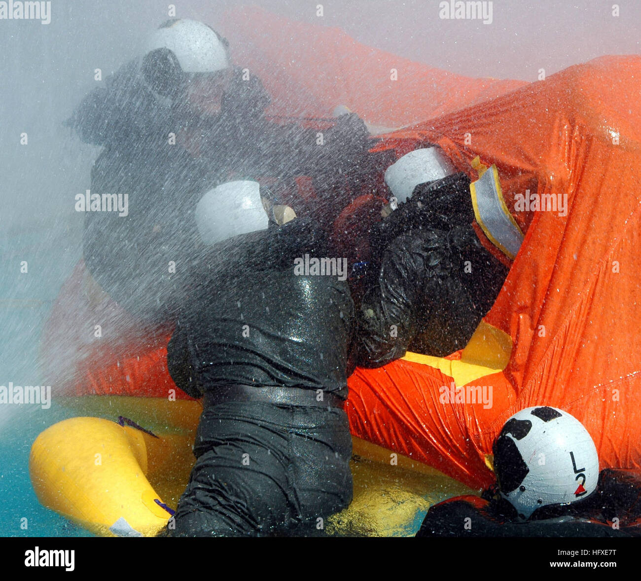 Navy man on raft hi-res stock photography and images - Alamy