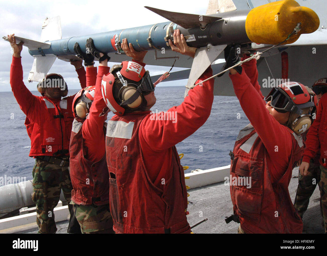 Aim 7f m sparrow missile aviation ordanancemen hi-res stock photography ...