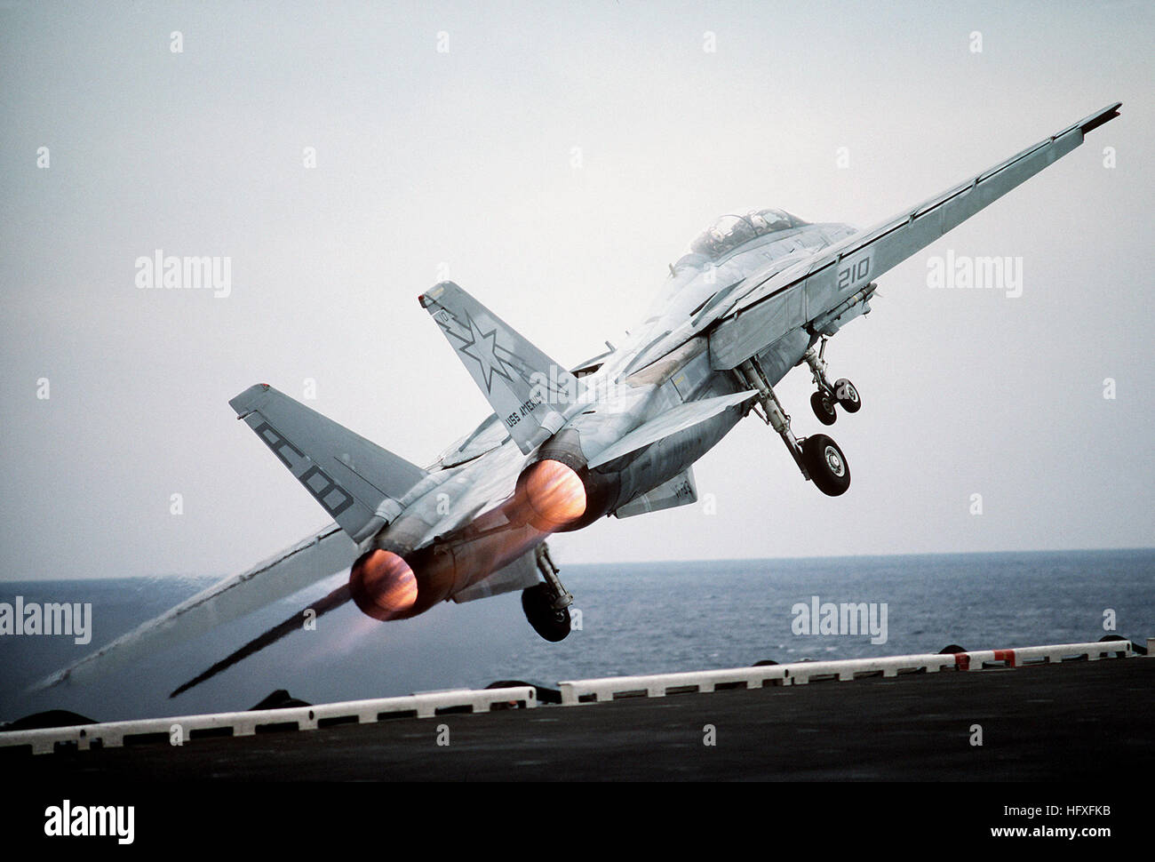 A Fighter Squadron 33 (VF-33) F-14A Tomcat aircraft is launched from ...