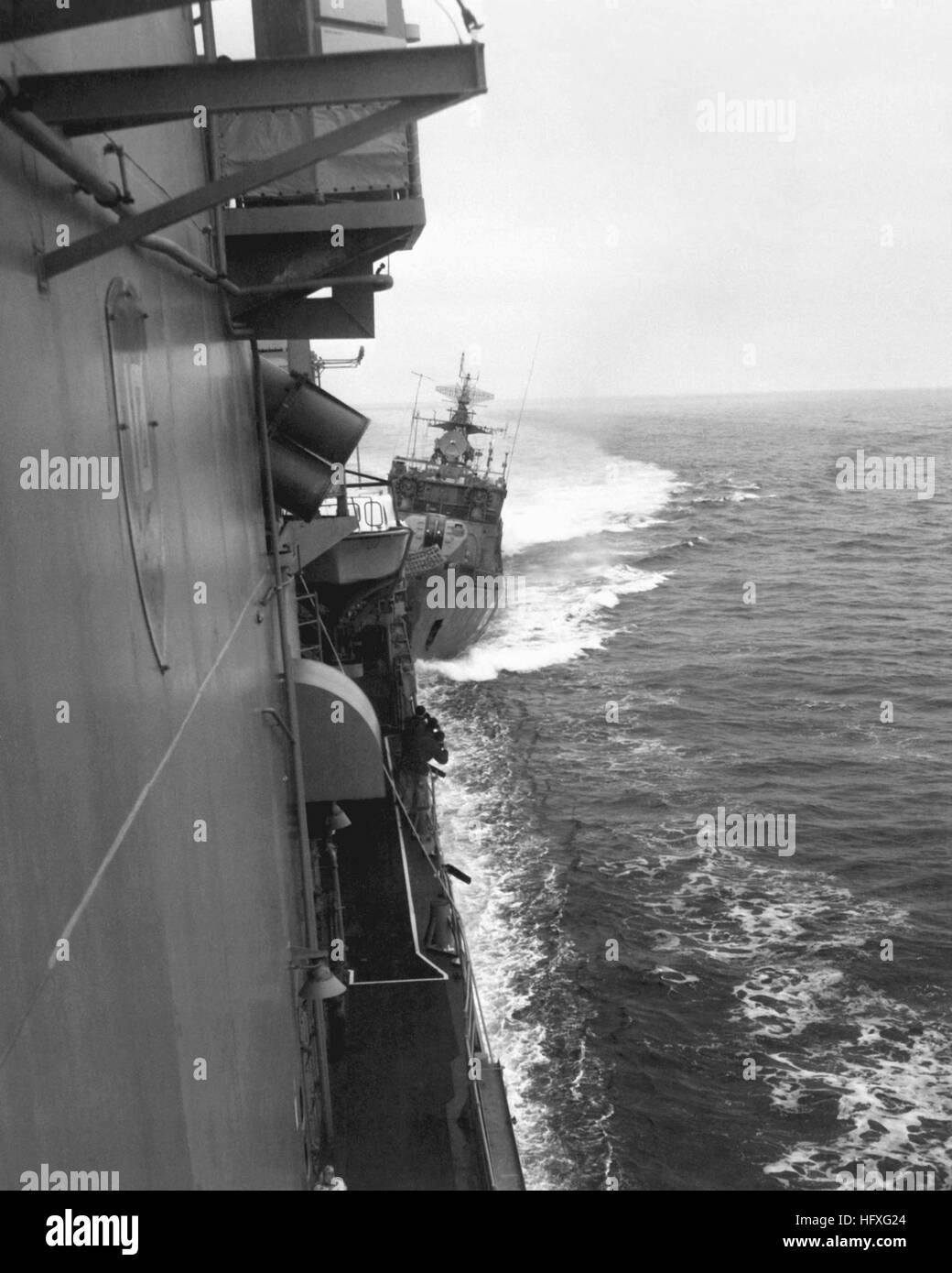 Destroyer USS Caron (DD-970) is struck by the bows of a Soviet Mirka II ...