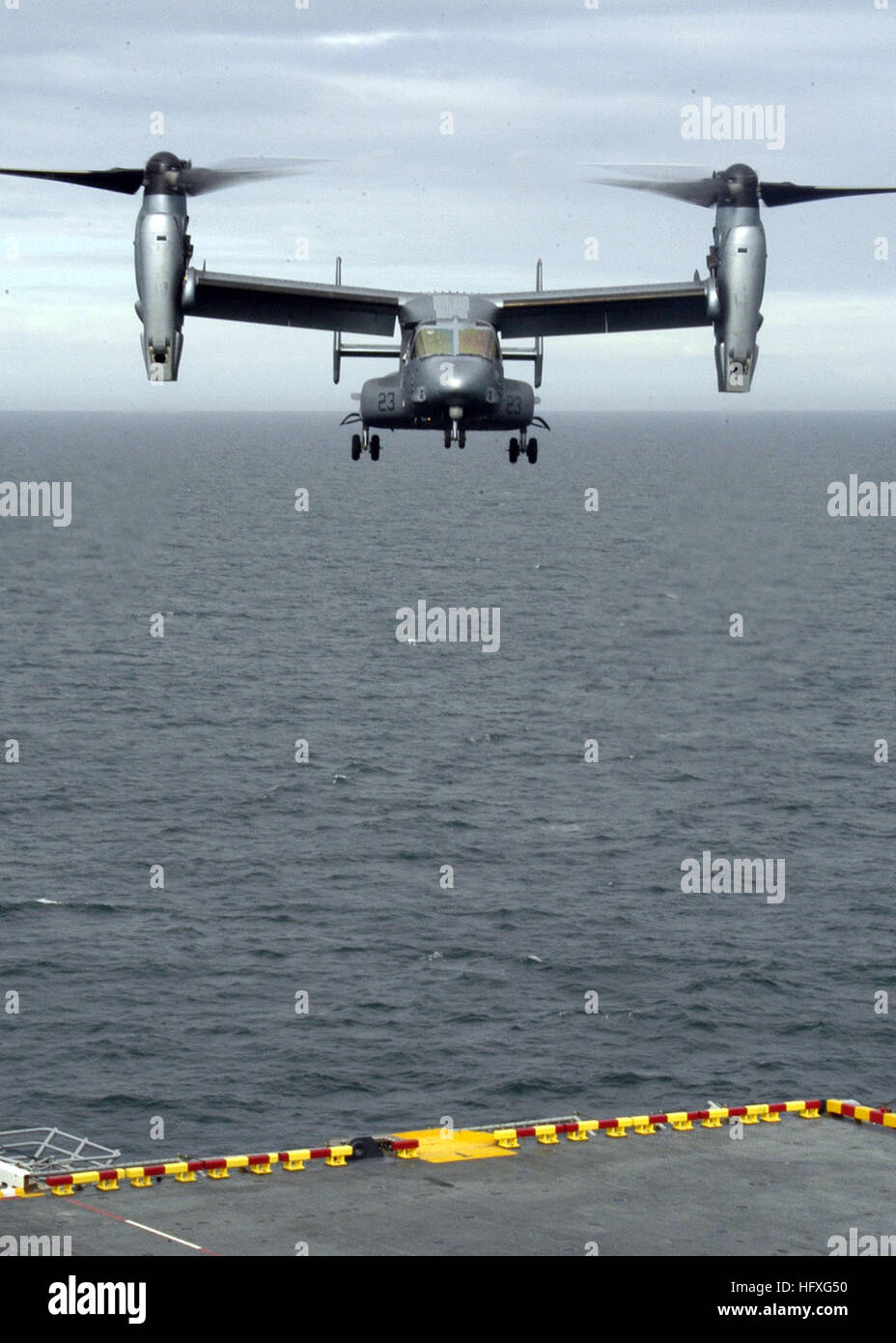 An MV-22B Osprey from VMX-22 lands on USS Wasp (LHD 1) flight deck ...