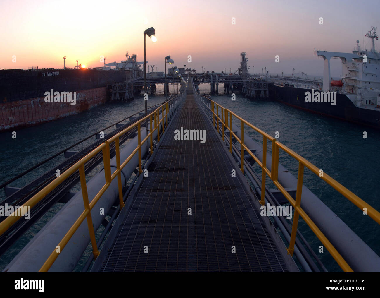 051120-N-2445C-079 Persian Gulf (Nov. 20, 2005) - The sun rises over ...