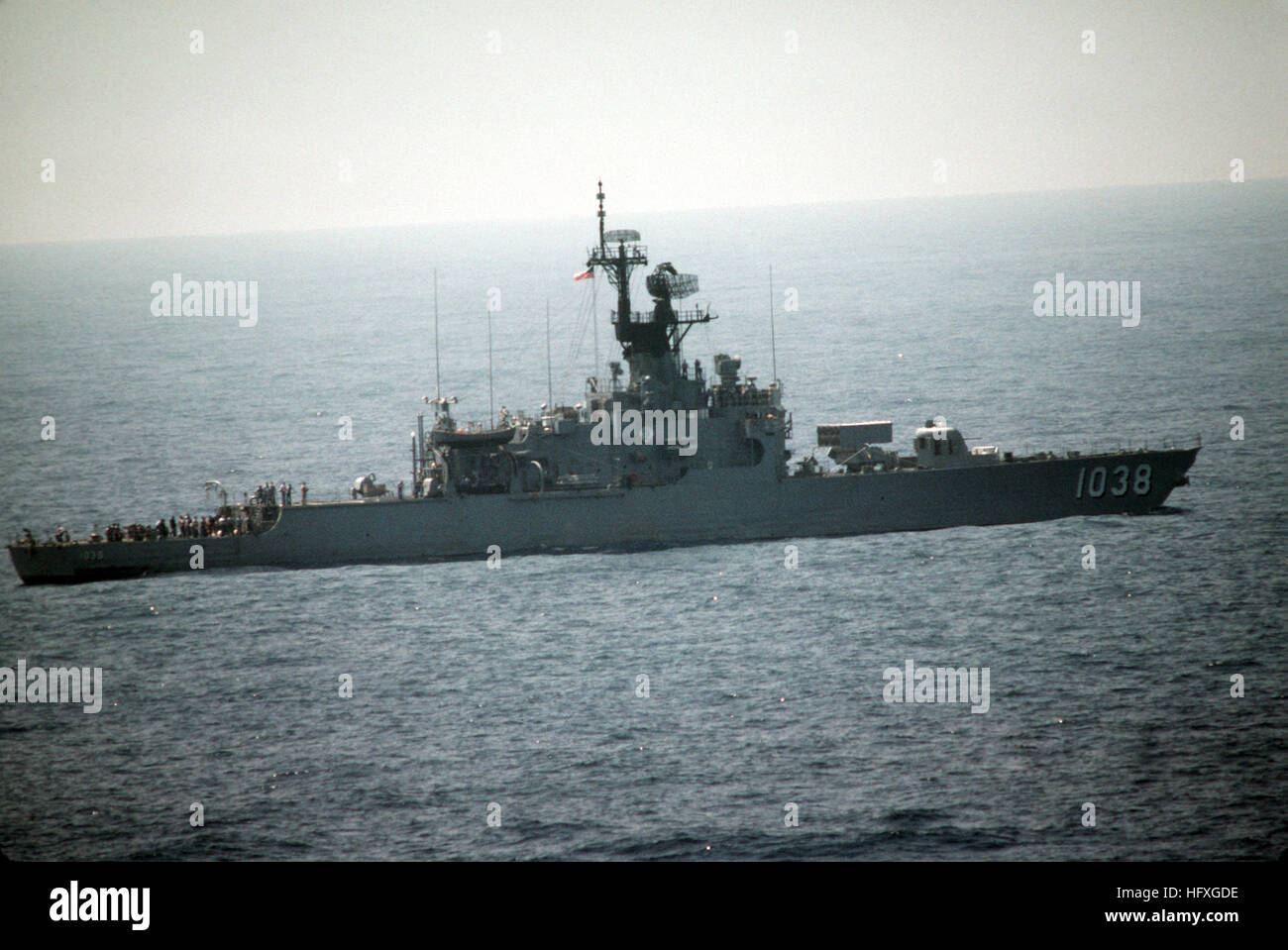 A starboard view of the frigate USS MCCLOY (FF 1038). The vessel is ...