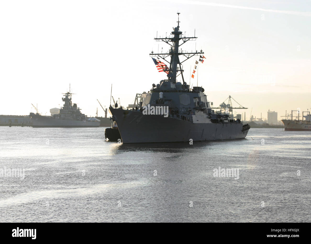 Guided missile destroyer USS McFaul (DDG 74) passes decommissioned ...