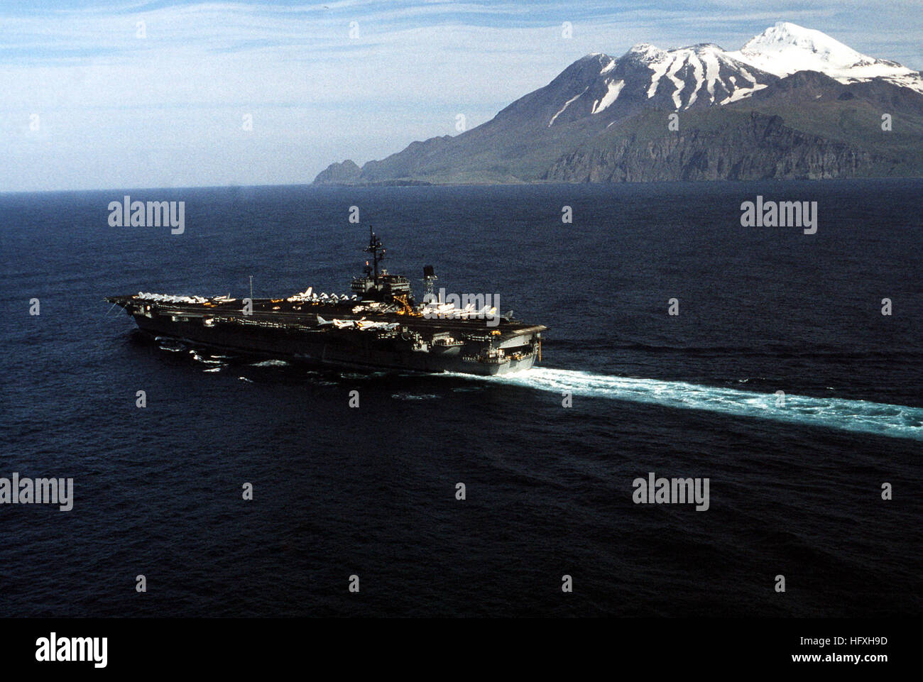 A port view of the aircraft carrier USS CONSTELLATION (CV 64) underway ...