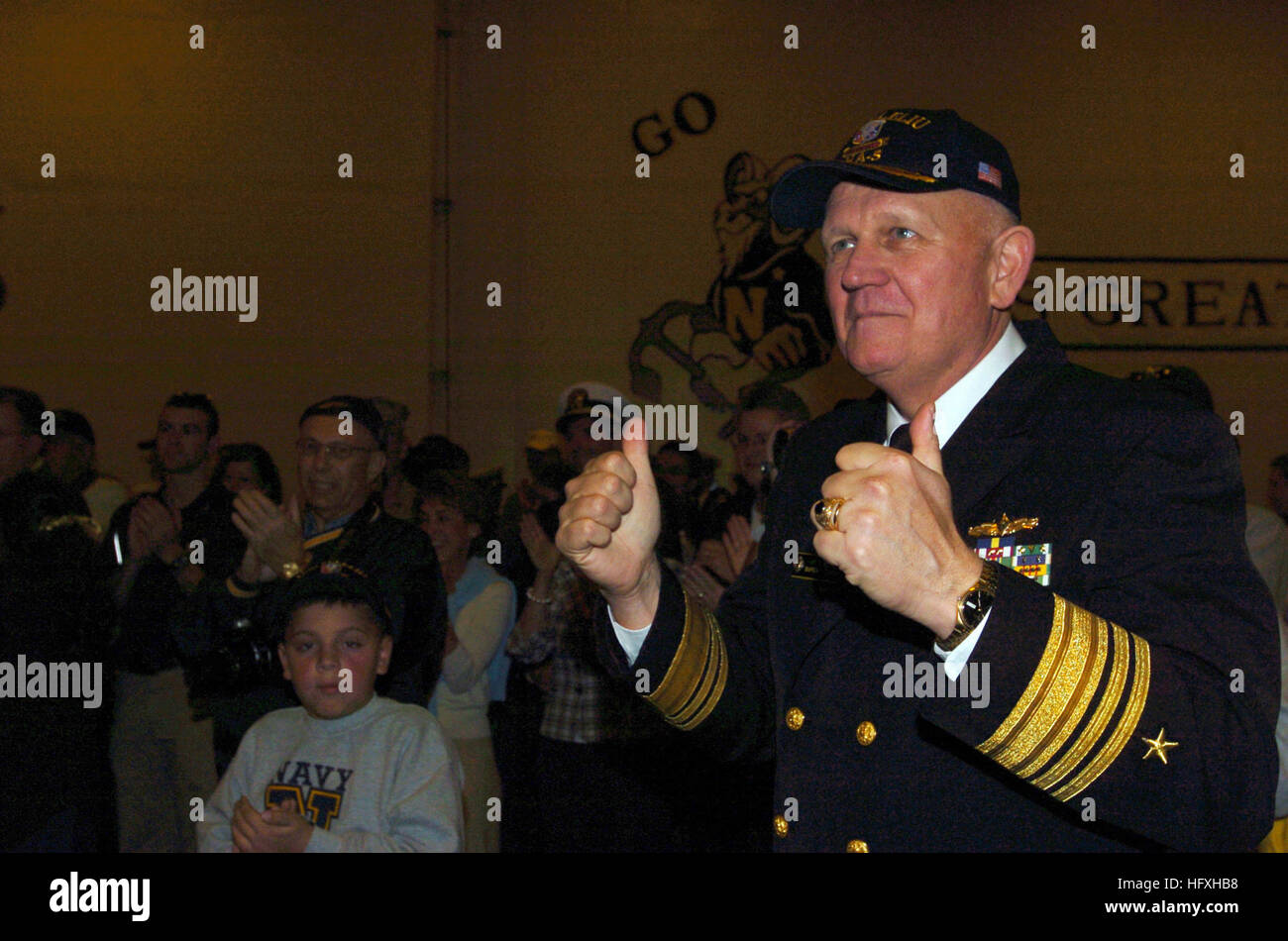 The U.S. Naval Academy Midshipmen gather in the hangar bay of USS ...