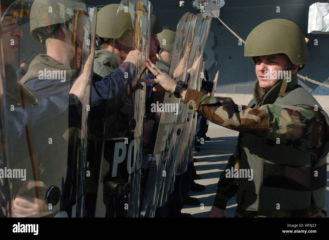 A riot control team of Sailors aboard the amphibious assault ship USS ...