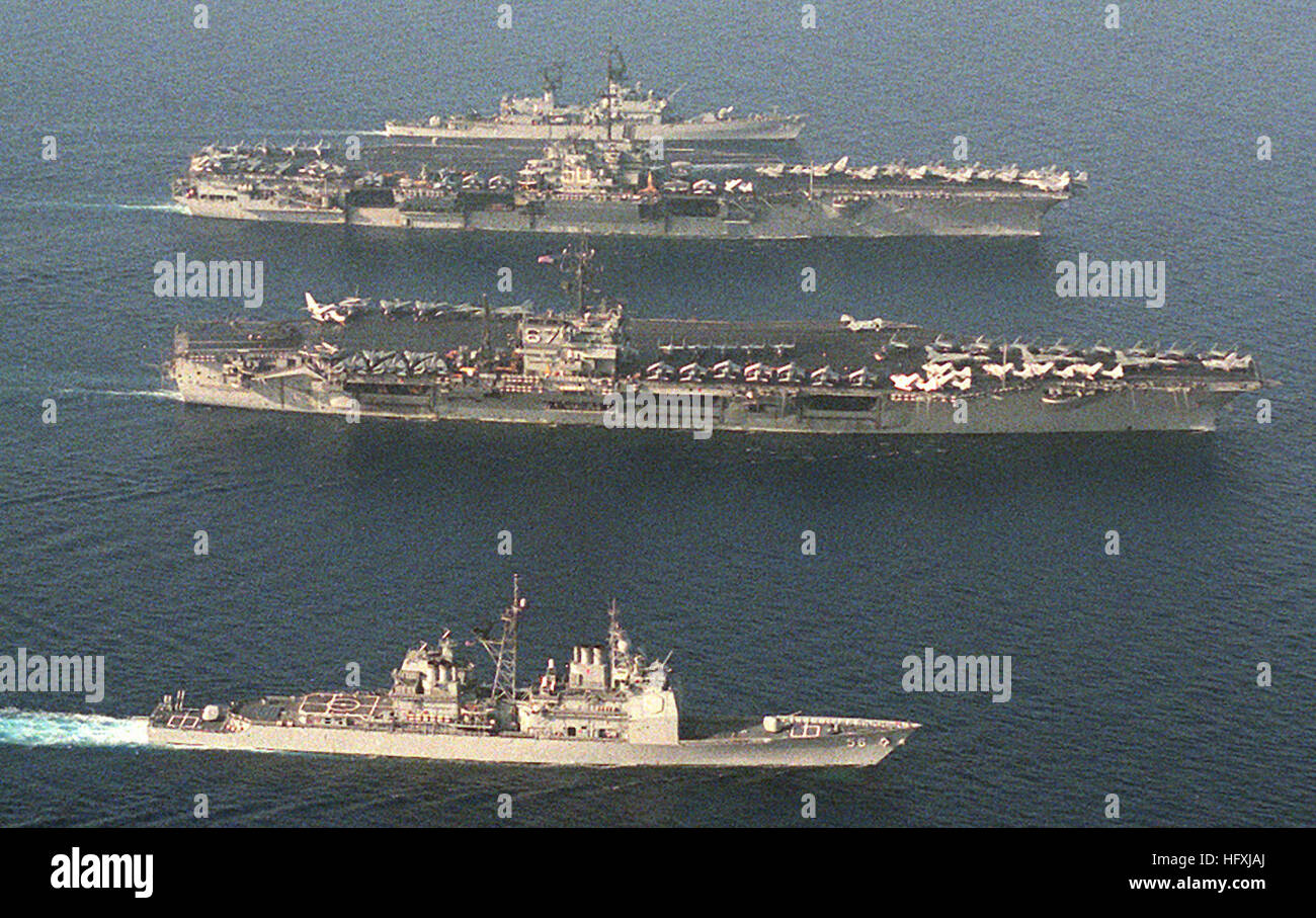 Aerial view of guided missile cruisers USS San Jacinto (CG-56) and USS ...
