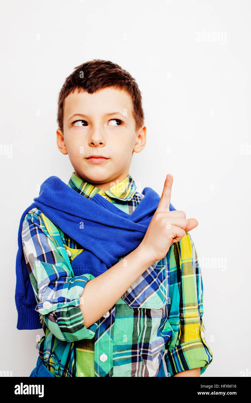 young pretty little boy kid wondering, posing emotional face isolated ...