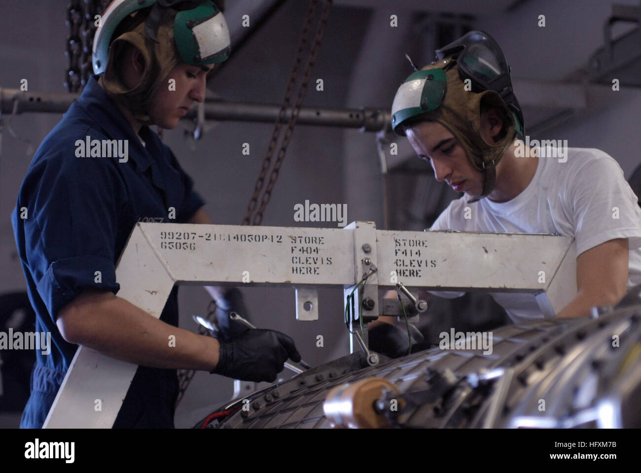 Maintenance on an F404 engine aboard USS Ronald Reagan (CVN 76) allows ...