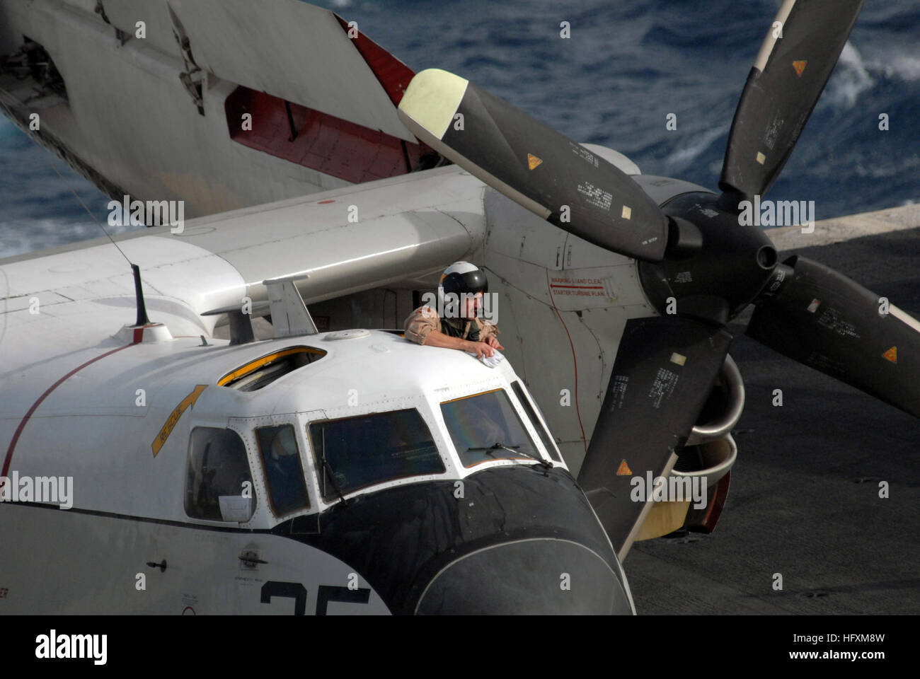 090704-N-9132C-046 ARABIAN SEA (July 4, 2009) Lt. Steven Parente cleans ...
