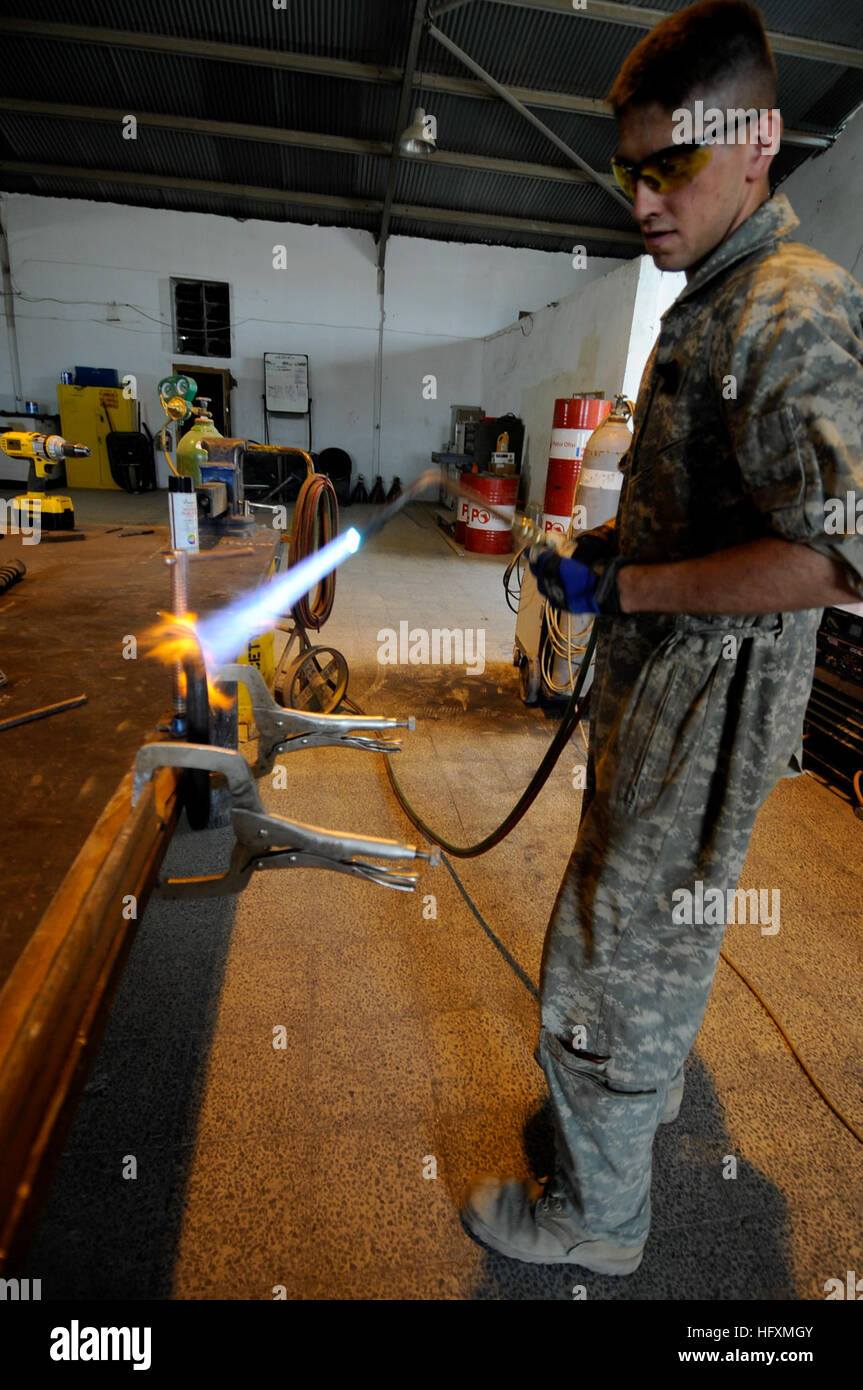 U.S. Army Spc. Nathan Ergenbright, 21, of Linden, Mich., assigned to ...