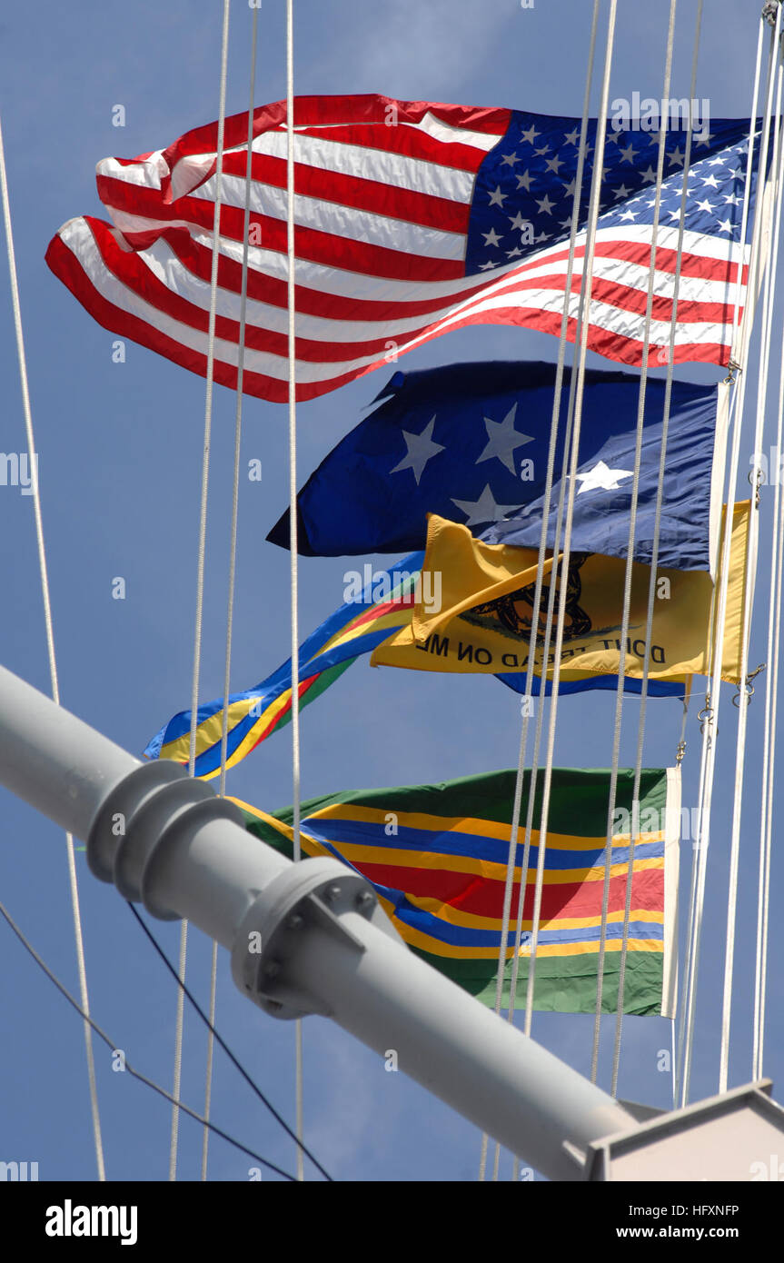 The command pennants of Adm. John C. Harvey Jr. are raised aboard the ...