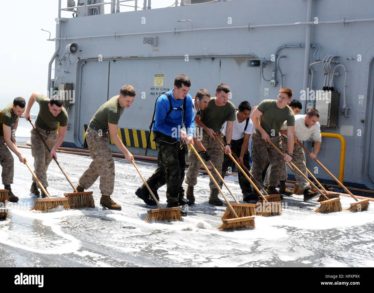 Sailors cleaning the deck of the ship hi-res stock photography and ...