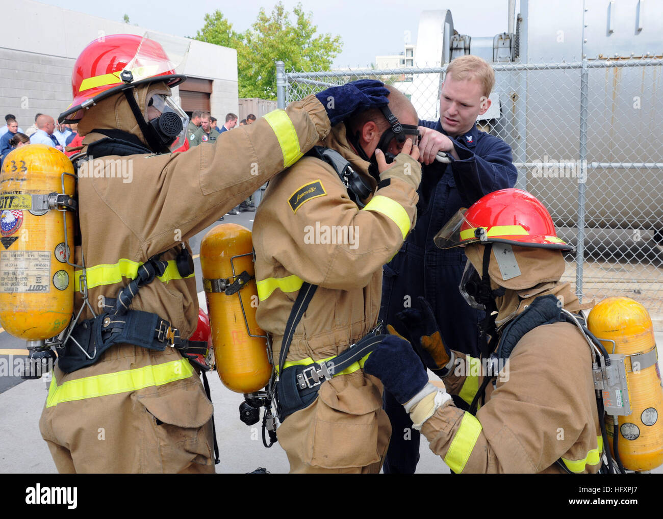 090818-N-2004W-091 SAN DIEGO (Aug. 18, 2009) Sailors help a shipmate ...