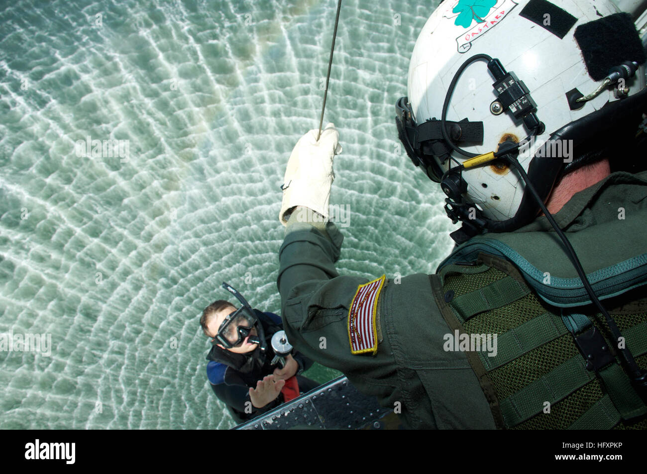 Search rescue swimmer hoisted helicopter hi-res stock photography and ...