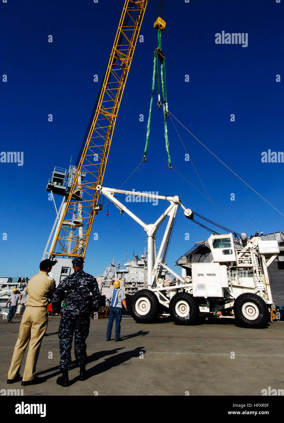 Chief Aviation Boatswain's Mate (Handling) Caleb McDonald, left, from ...