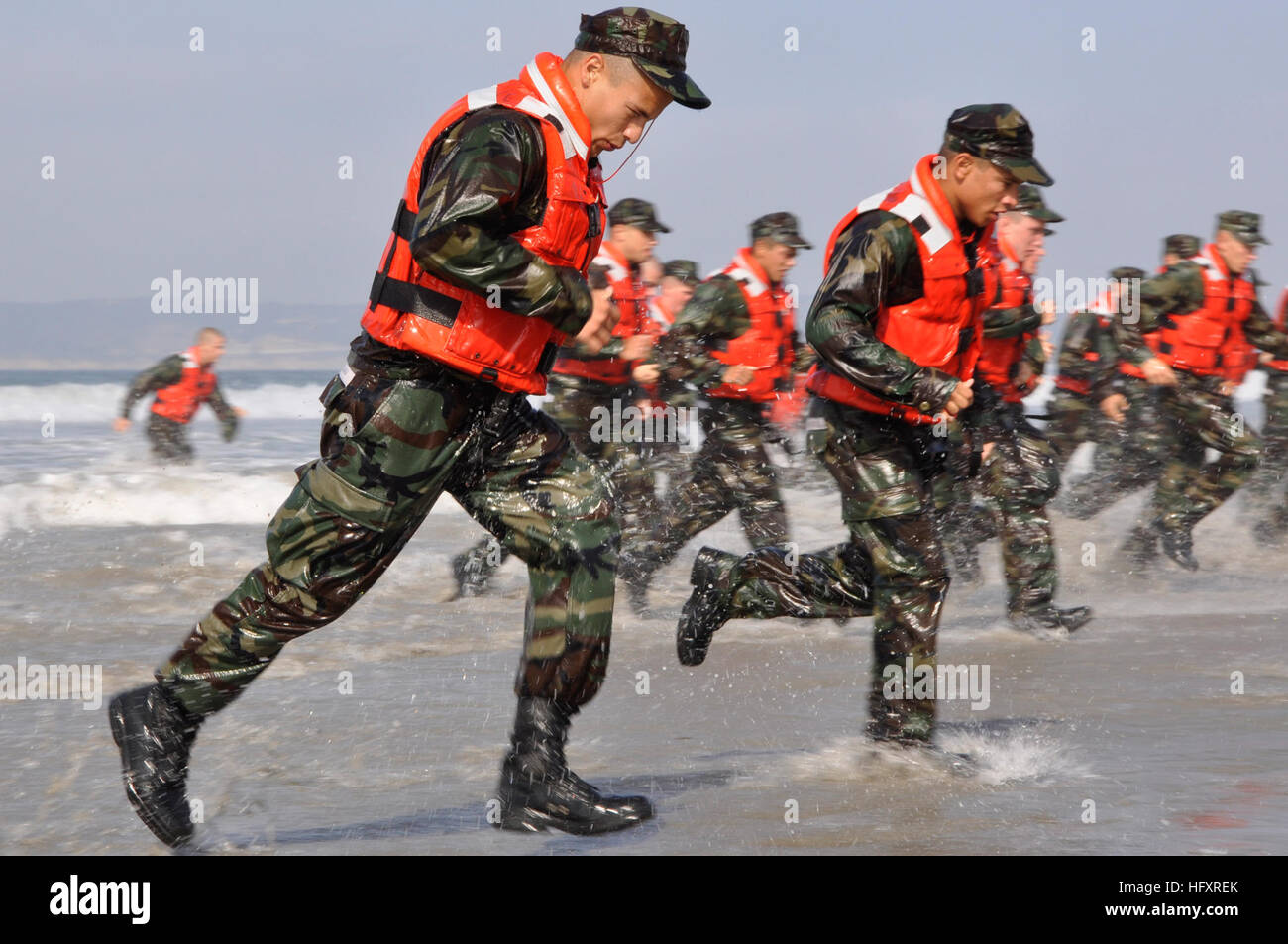 BUD/S class 279 students conduct a surf passage exercise at Naval ...