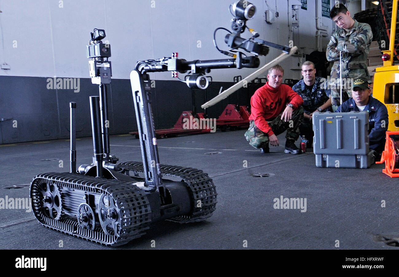 Machinist's Mate remotely operates Talon 4 Counter IED robot aboard ...
