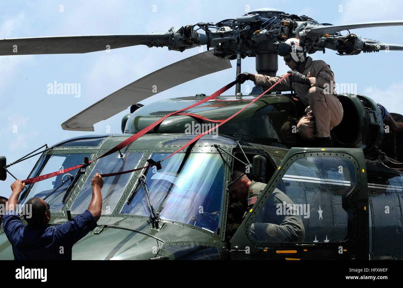 Sailor from Helicopter Antisubmarine Squadron Light (HSL) 51 prepares ...