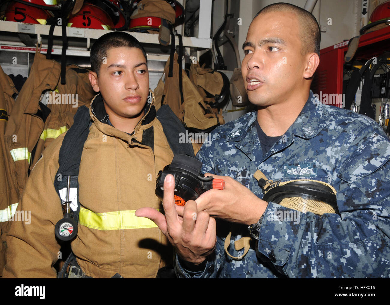 Sailors aboard USS Frank Cable (AS 40) receive fleet indoctrination ...