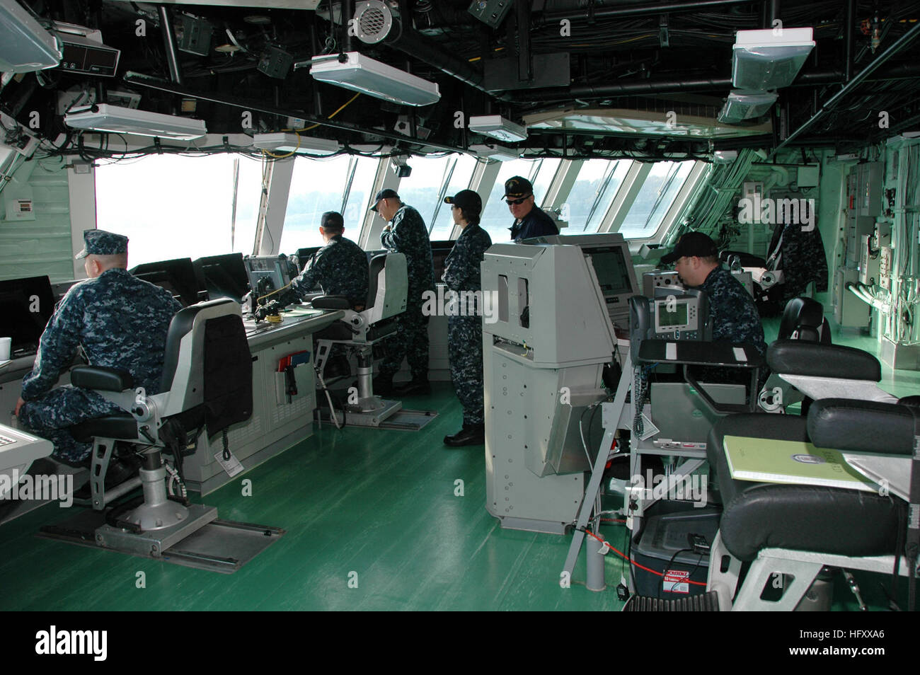 Sailors stand watch on USS Freedom’s bridge during a sea and anchor ...