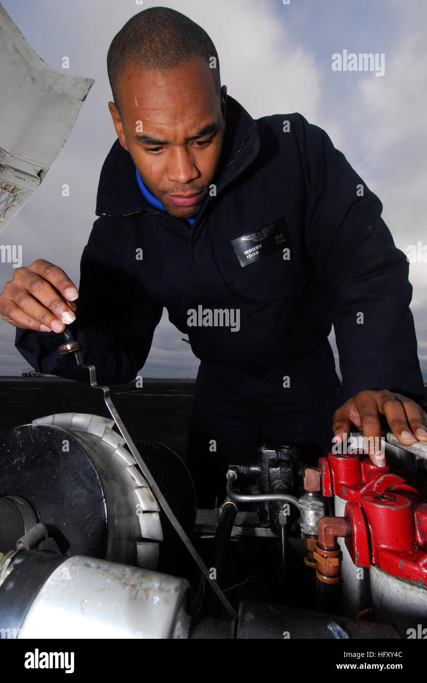 Us navy flight deck tractor hi-res stock photography and images - Alamy