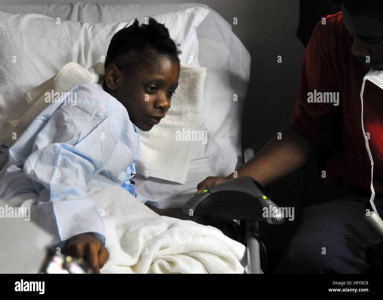 100119-N-4774B-214 PORT-AU-PRINCE (Jan. 19, 2010) A 12-year-old patient ...
