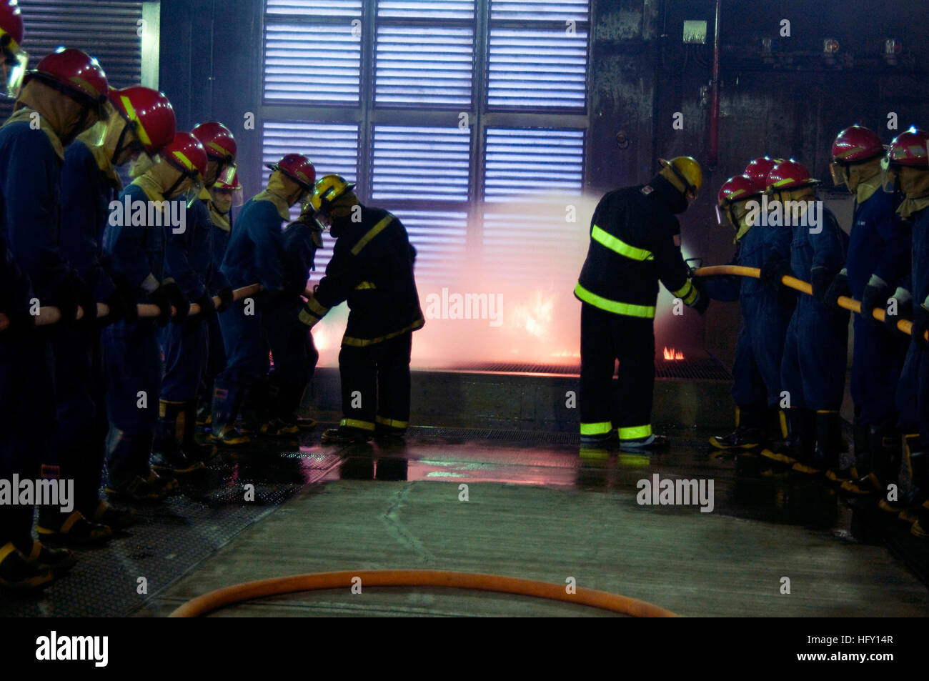 Fire hose handling hi-res stock photography and images - Alamy