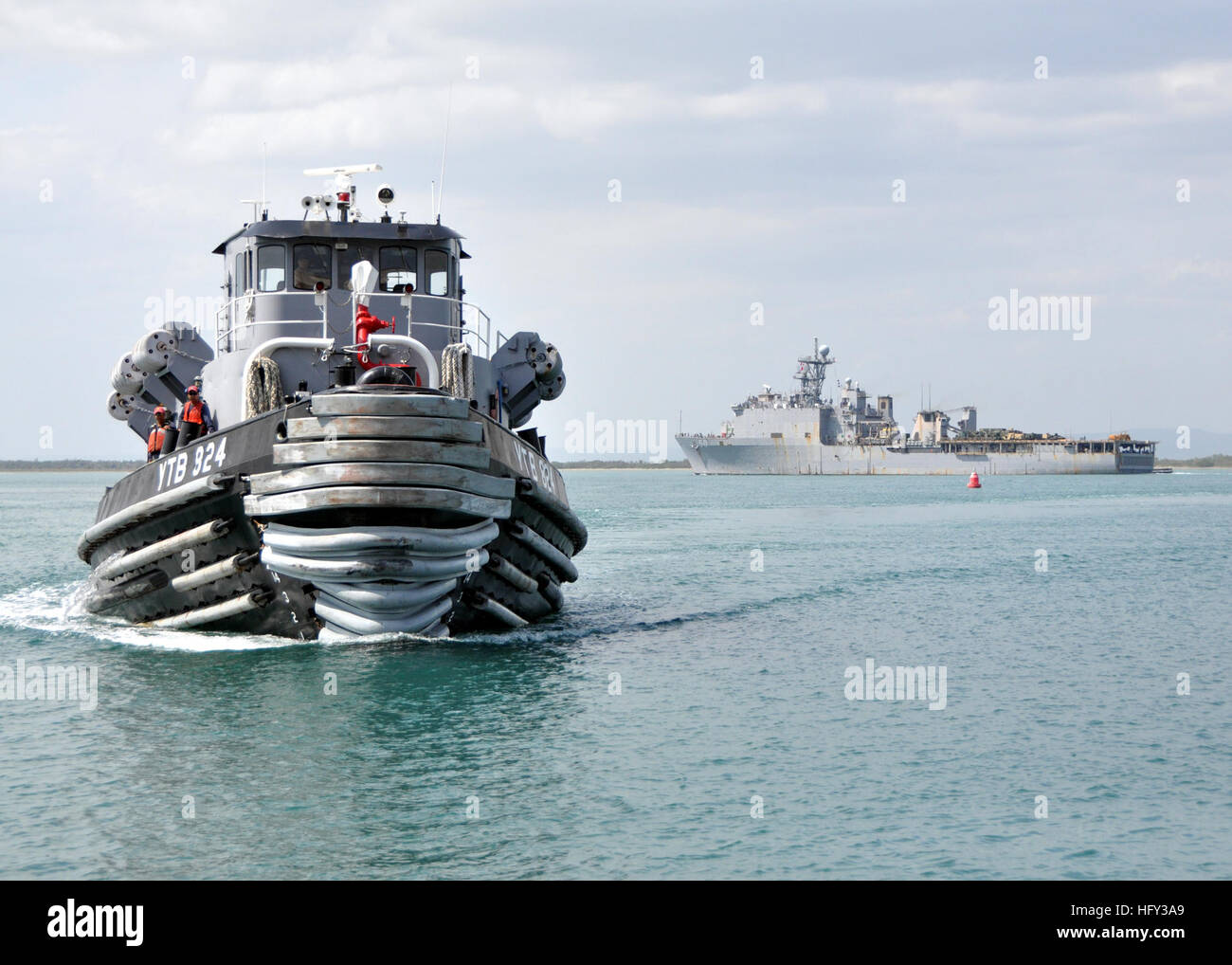 Tug boat and war ship hi-res stock photography and images - Alamy