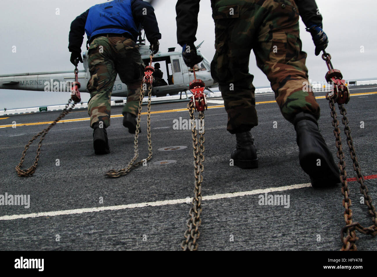 (Left to right) Airman Nathan Hernandez, aviation boatswain's mate ...
