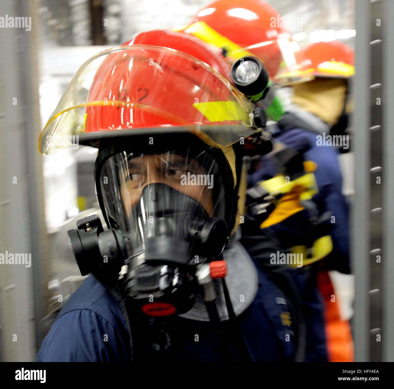 Sailors aboard USS Independence conduct a damage control training drill ...
