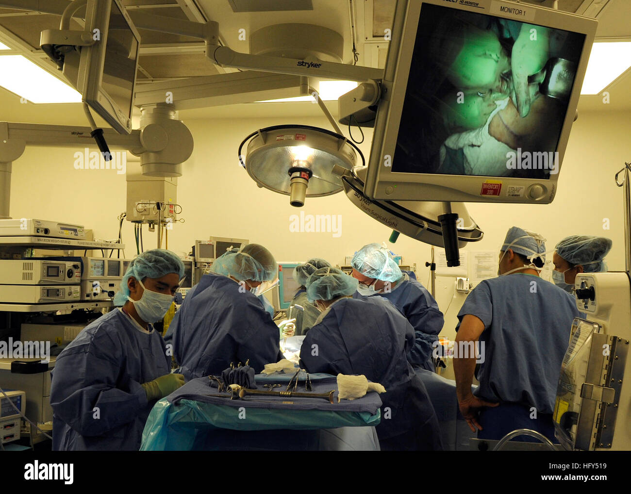 110407-N-OV243-046 SAN DIEGO (April 7, 2011) Surgeons perform a ...