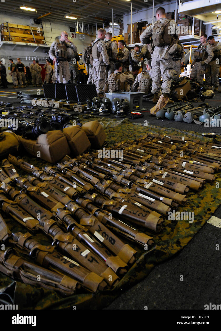 Marines assigned to the 15th Marine Expeditionary Unit take inventory ...