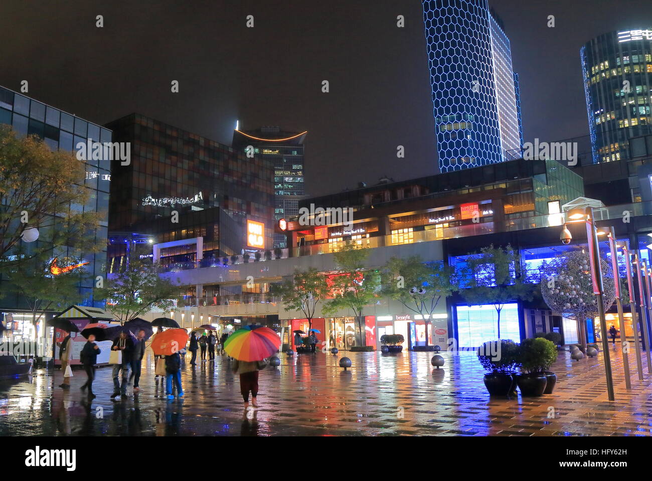 People visit Sanlitun village Tai Koo Li shopping mall in Beijing China ...