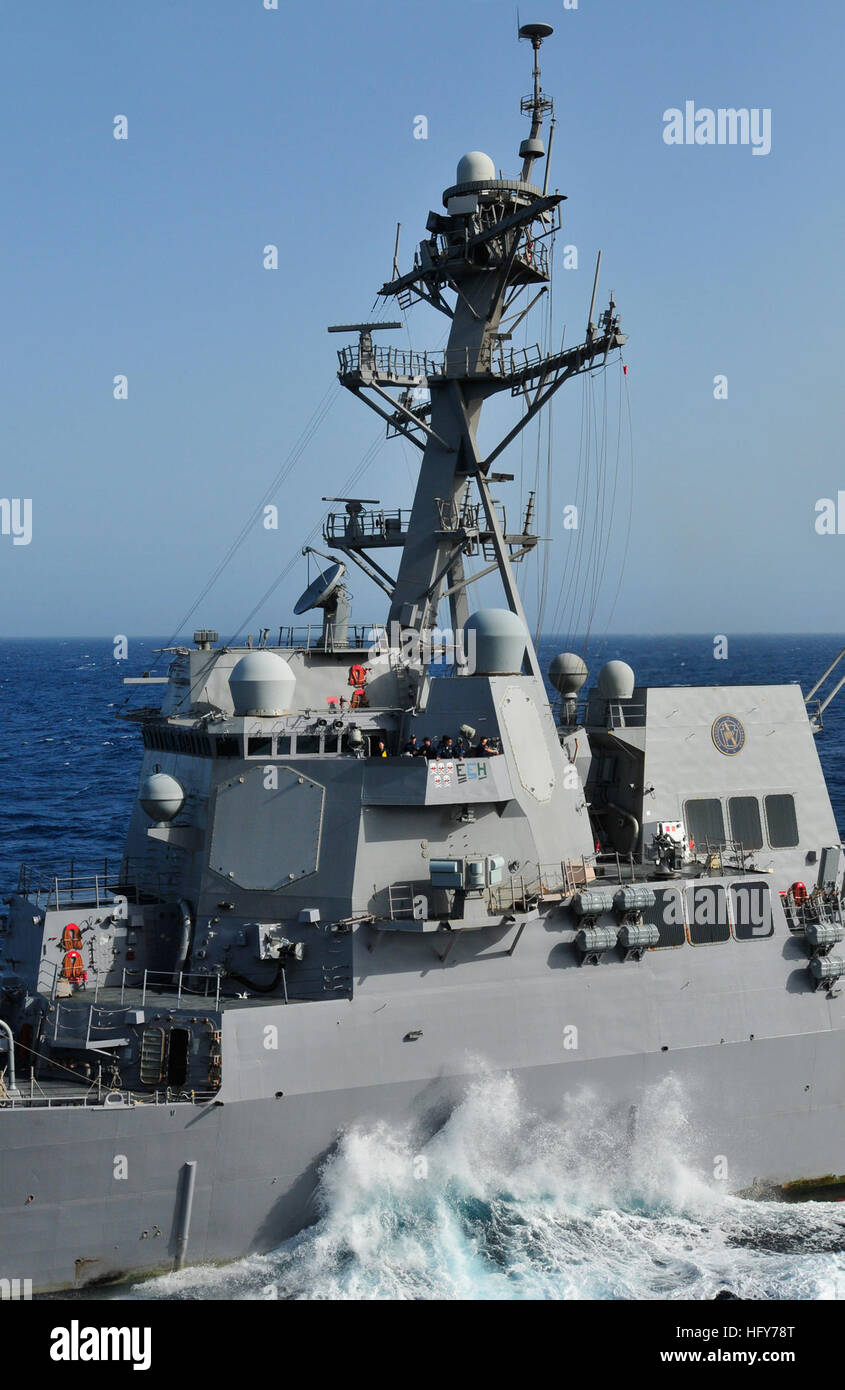 Guided-missile destroyer USS Farragut (DDG 99) operates alongside ...