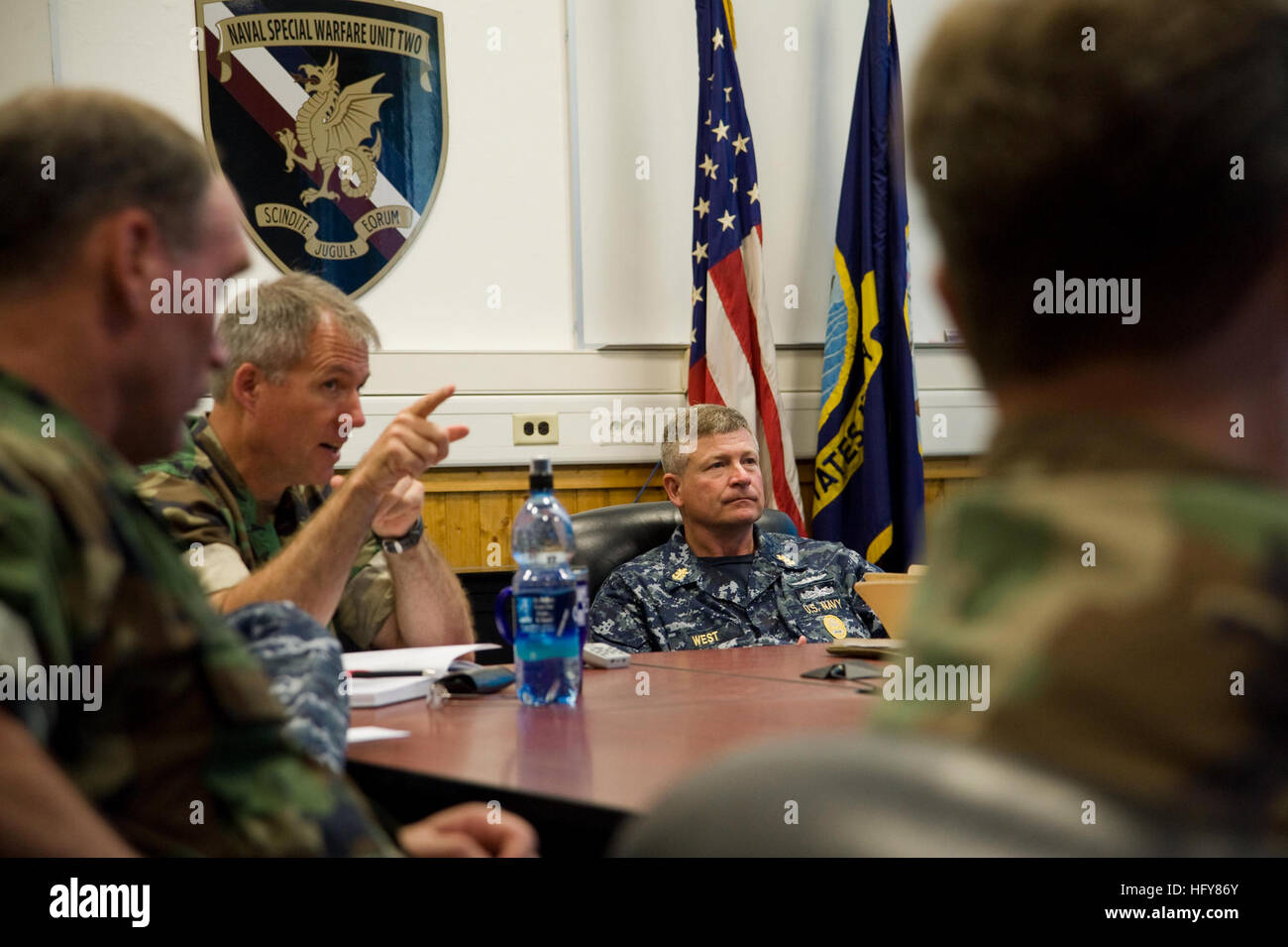 Naval leadership receives an operational briefing from NSWU-2 personnel ...