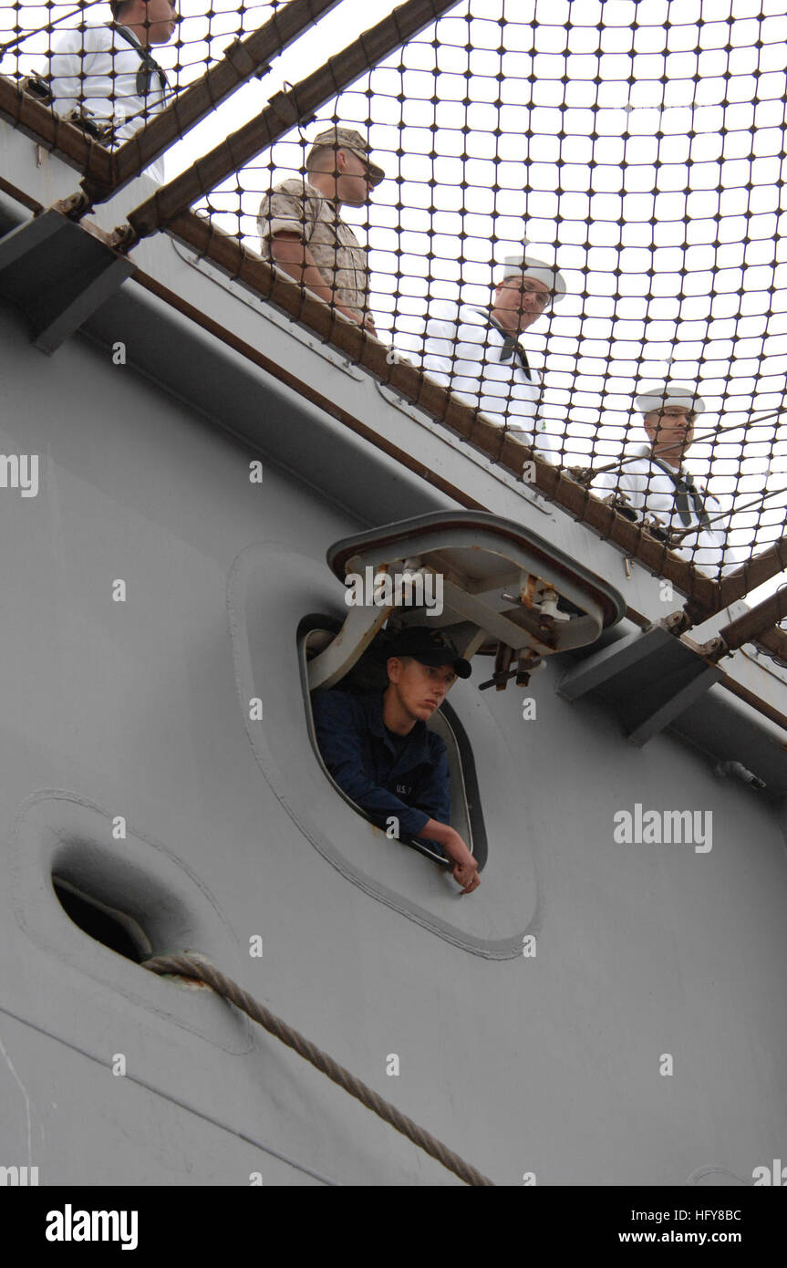 A line petty officer and crew aboard USS New Orleans (LPD 18) operate ...