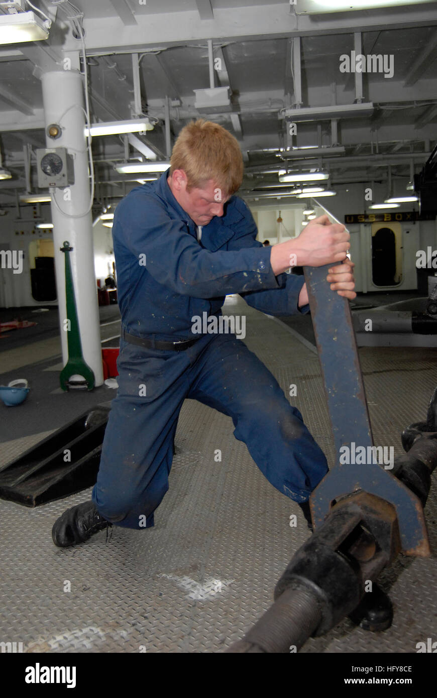 100610-N-6552M-022 SAN DIEGO (June 10, 2010) Seaman Kyle Varga tightens ...