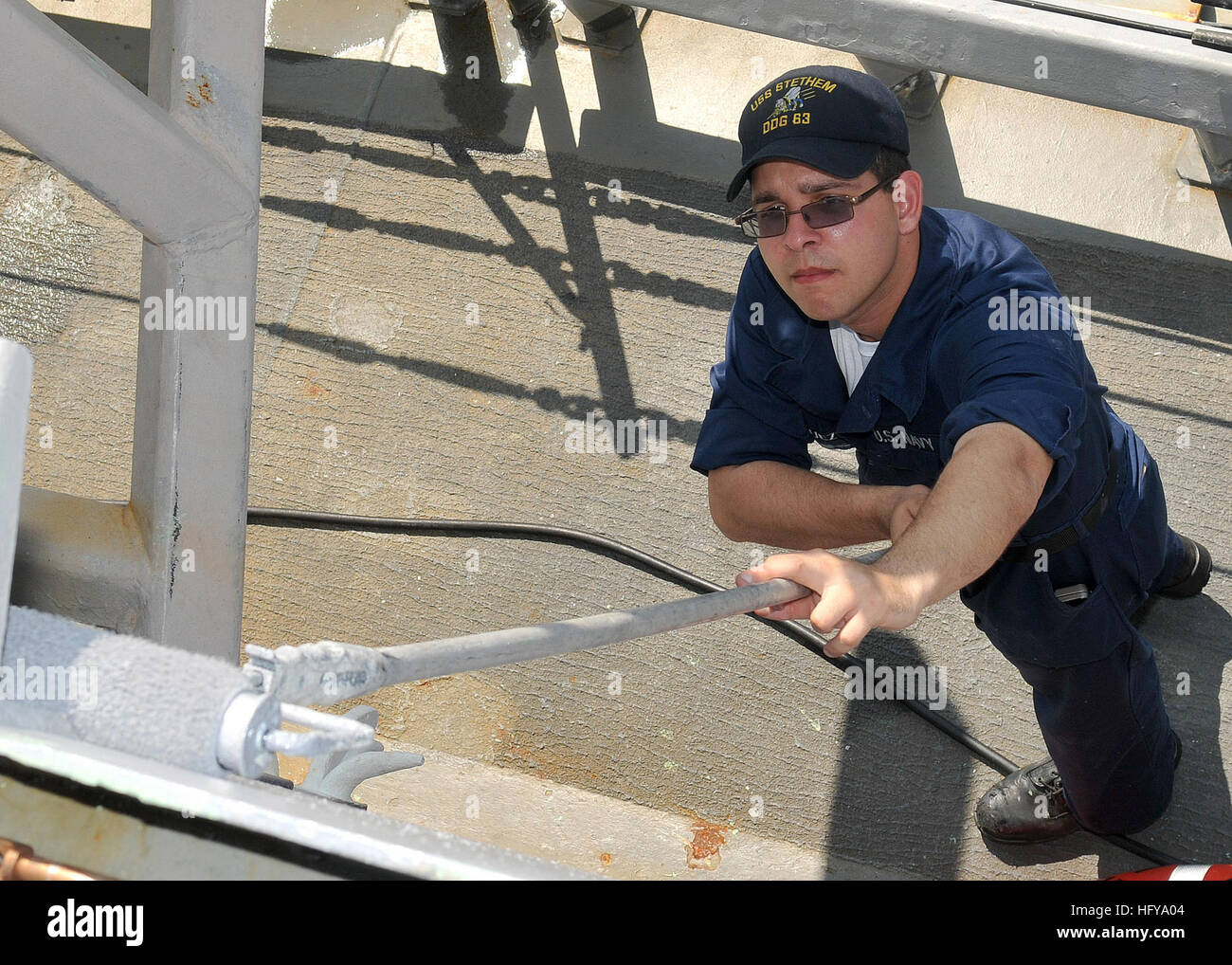 A Sonar Technician (Surface) paints an exterior bulkhead during ship ...