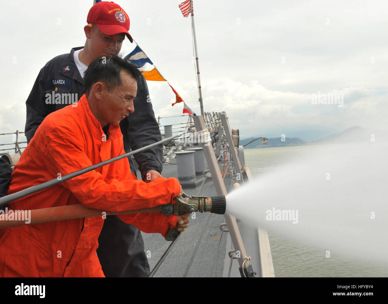 Personnel from guided-missile destroyer USS John S. McCain (DDG 56 ...