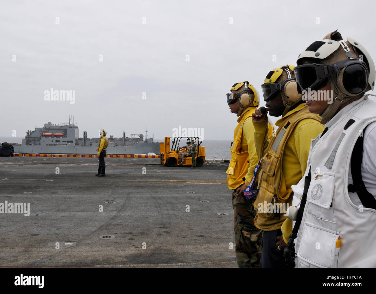 Chief Petty Officer Teodorico Claudio, Petty Officer 1st Class Jeremy ...