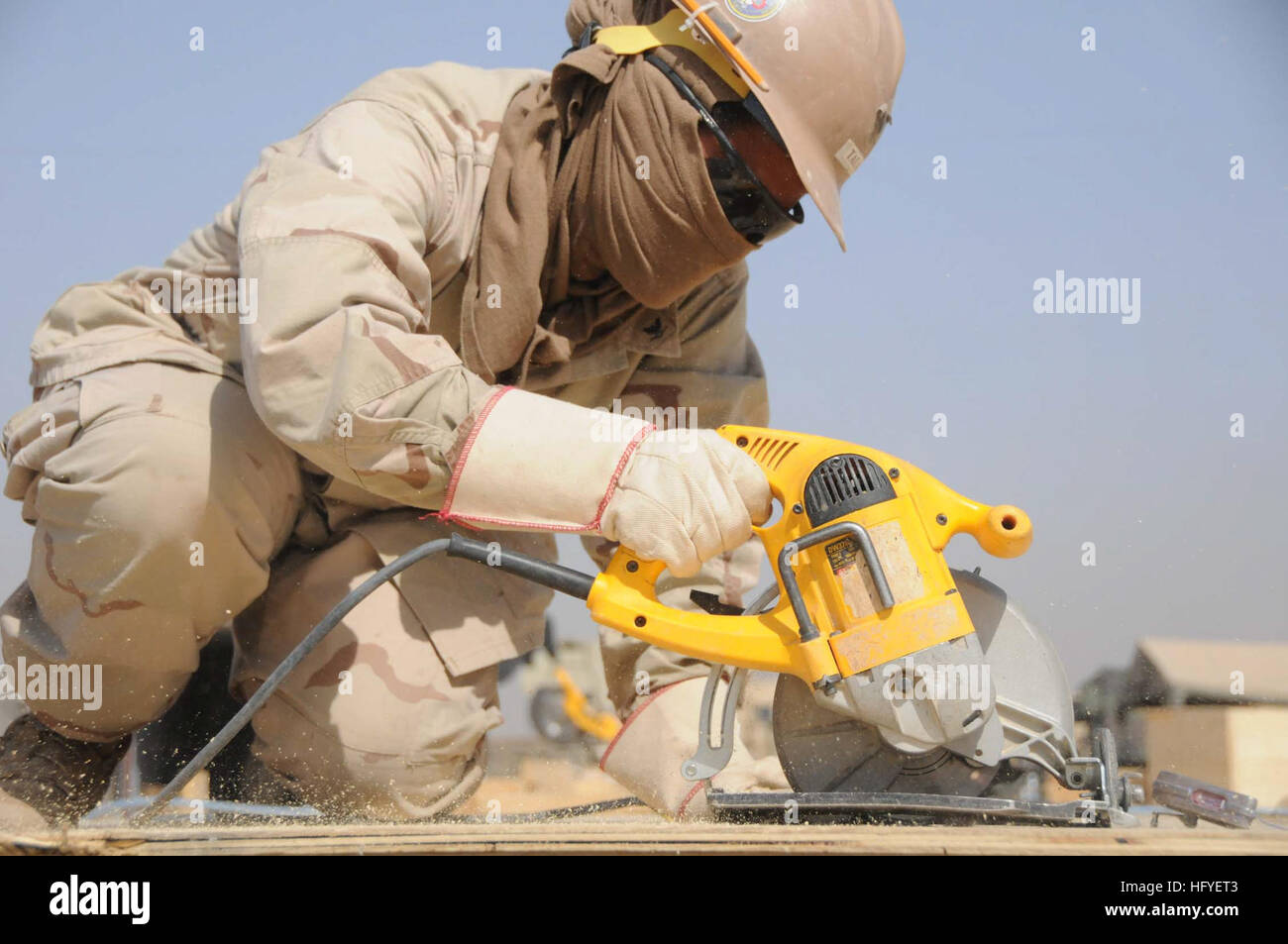 Seabees from Naval Mobile Construction Battalions 18 and 40 cut wood at ...