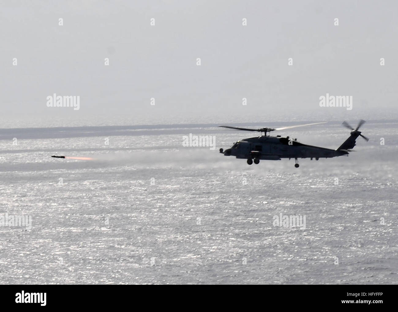 Helicopter fires hellfire missile hi-res stock photography and images ...