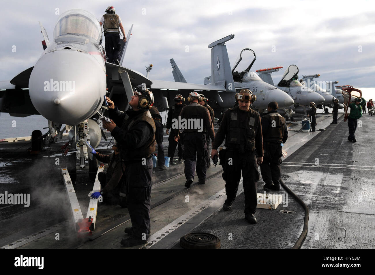 Sailors assigned to the Black Knights of Strike Fighter Squadron (VFA ...