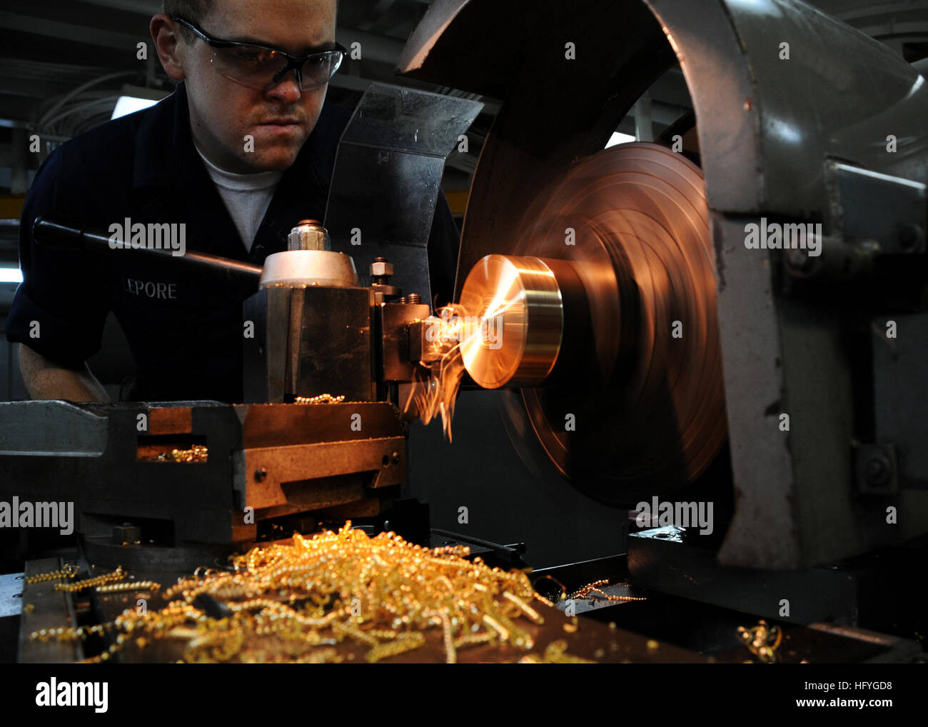 Fireman Mark A. Lepore, machinery repairman, from Rochester, N.Y., uses ...